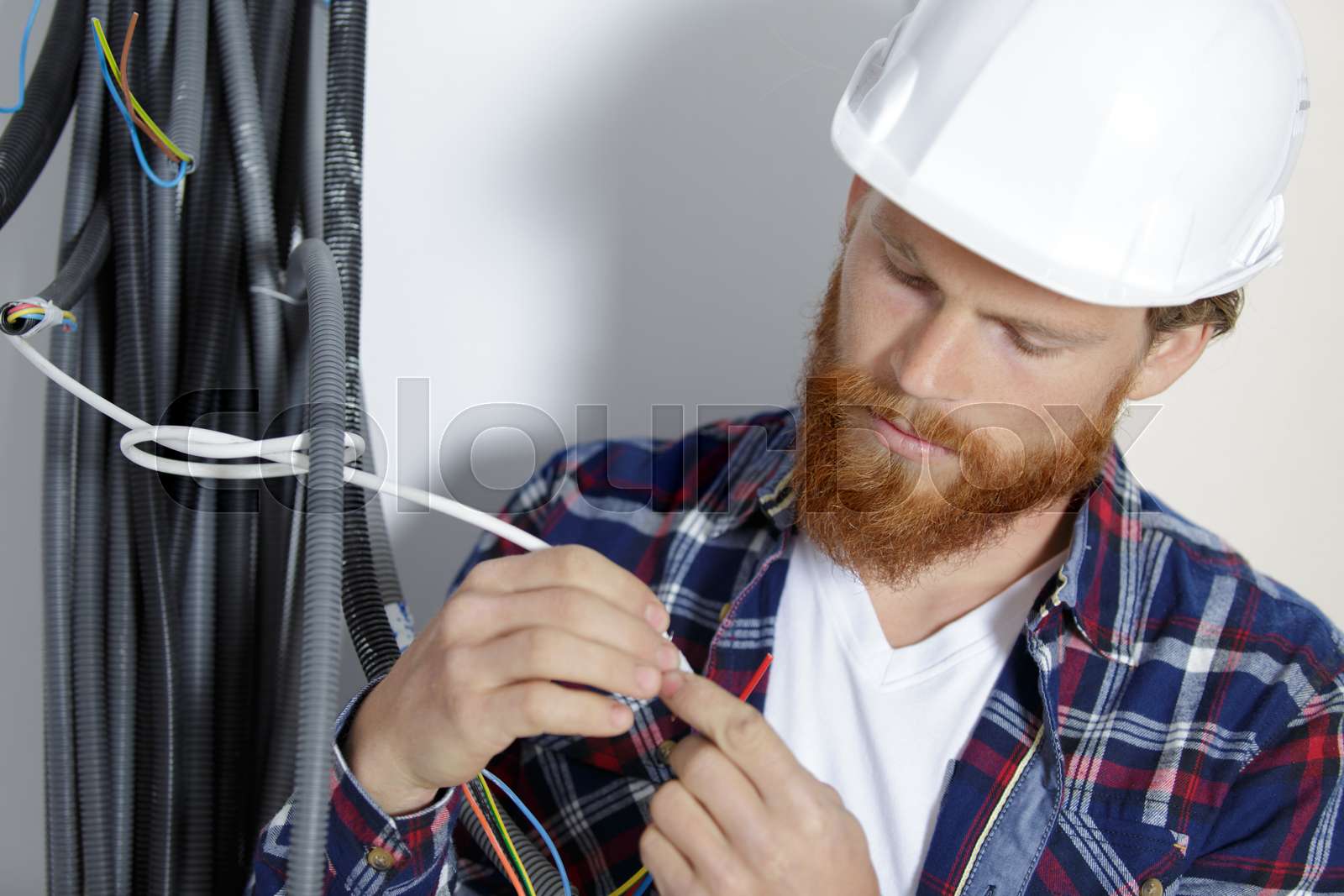 Electrician Repairing Fixing Wires In The Wall Stock Image Colourbox