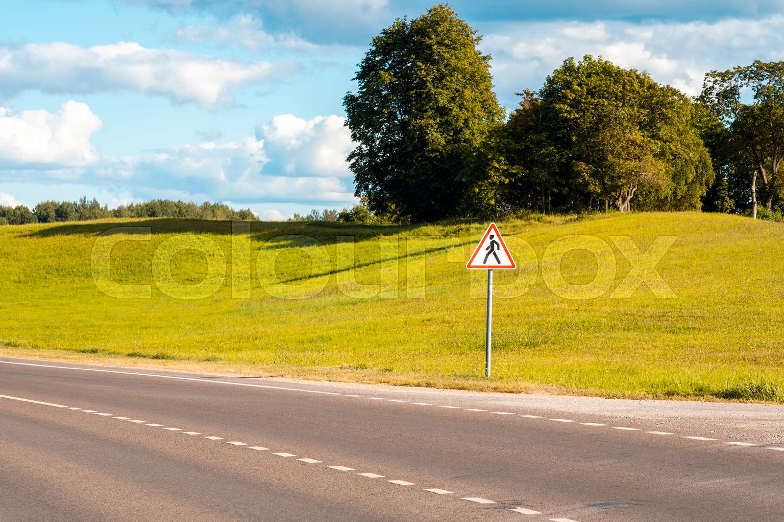Country road and pedestrians in road sign | Stock image | Colourbox