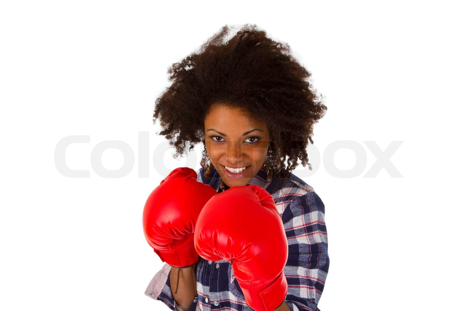 Female afro american with red boxing gloves | Stock image | Colourbox