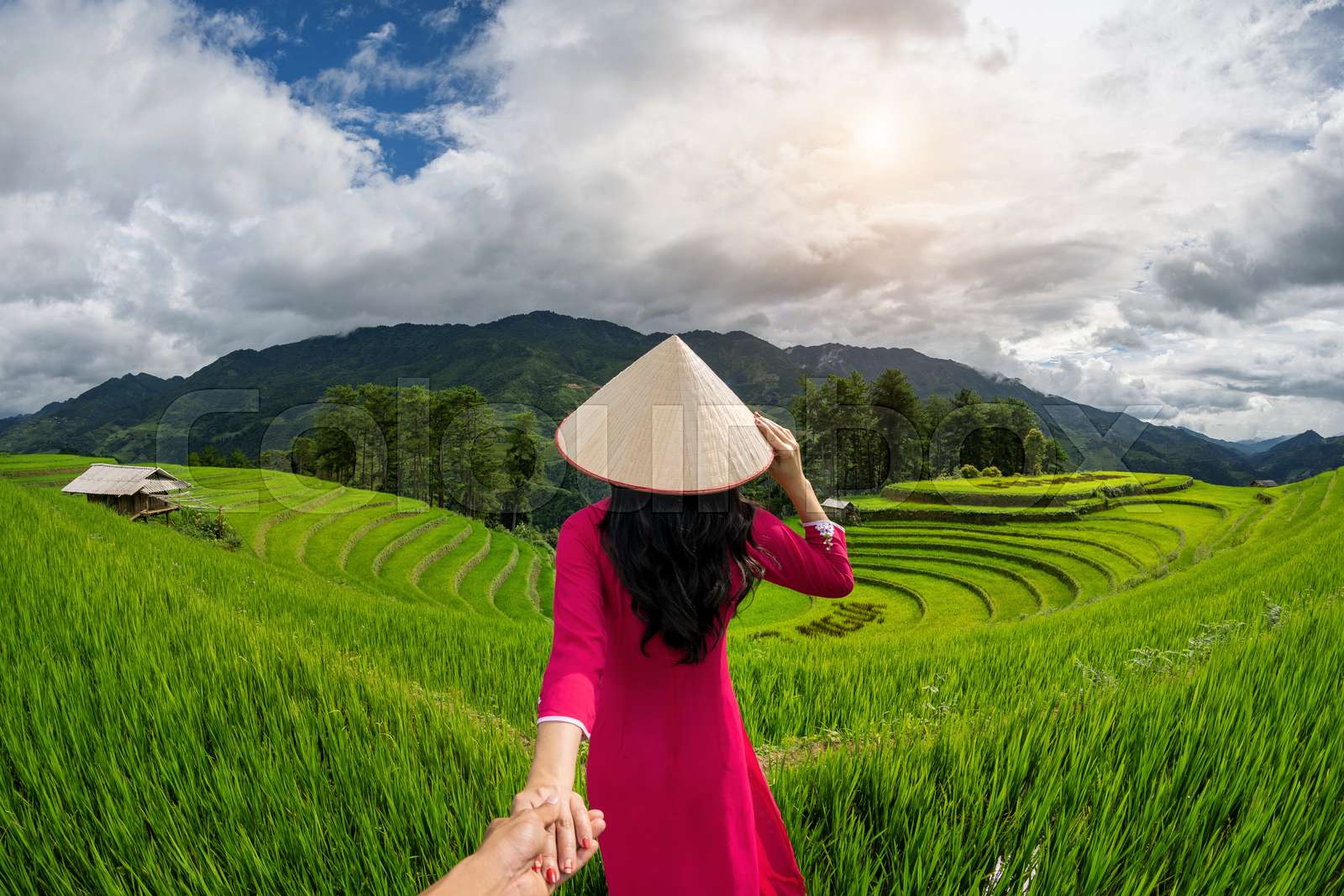 Asian woman wearing Vietnam culture traditional holding man's hand and ...