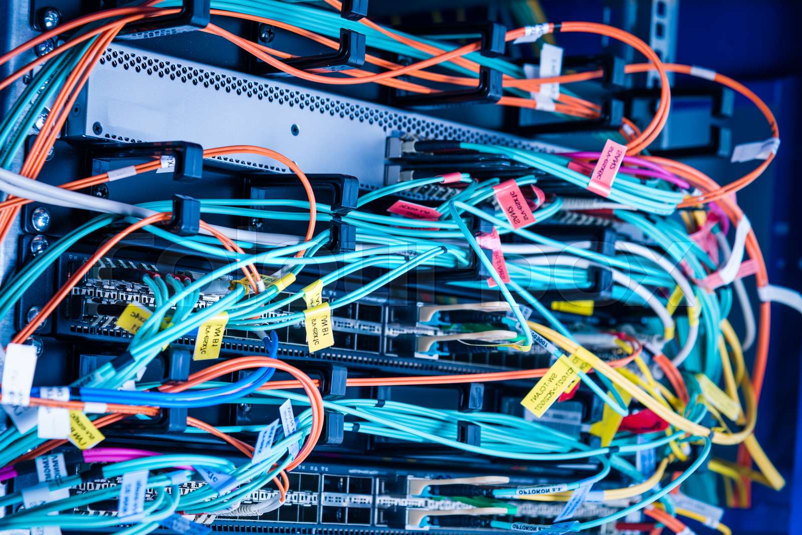 detail of server rack with fiber optic cables attached to front - Stock ...