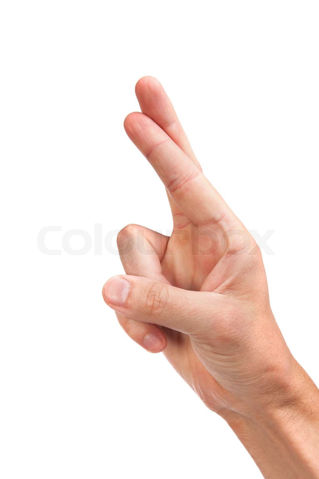 Crossed fingers symbolizing good luck isolated on white | Stock image ...