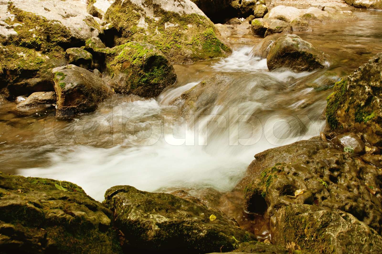 Fast flowing water | Stock image | Colourbox