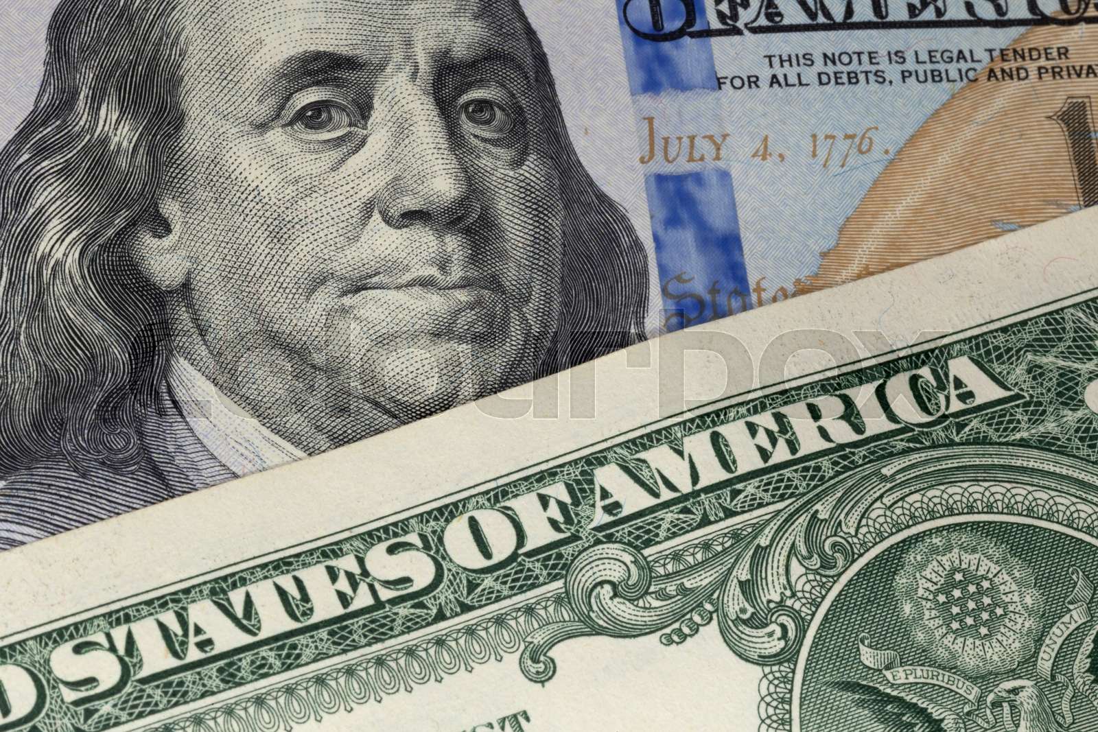 One US Dollar Banknote Lying On 100 Dollars Banknote Stock Image