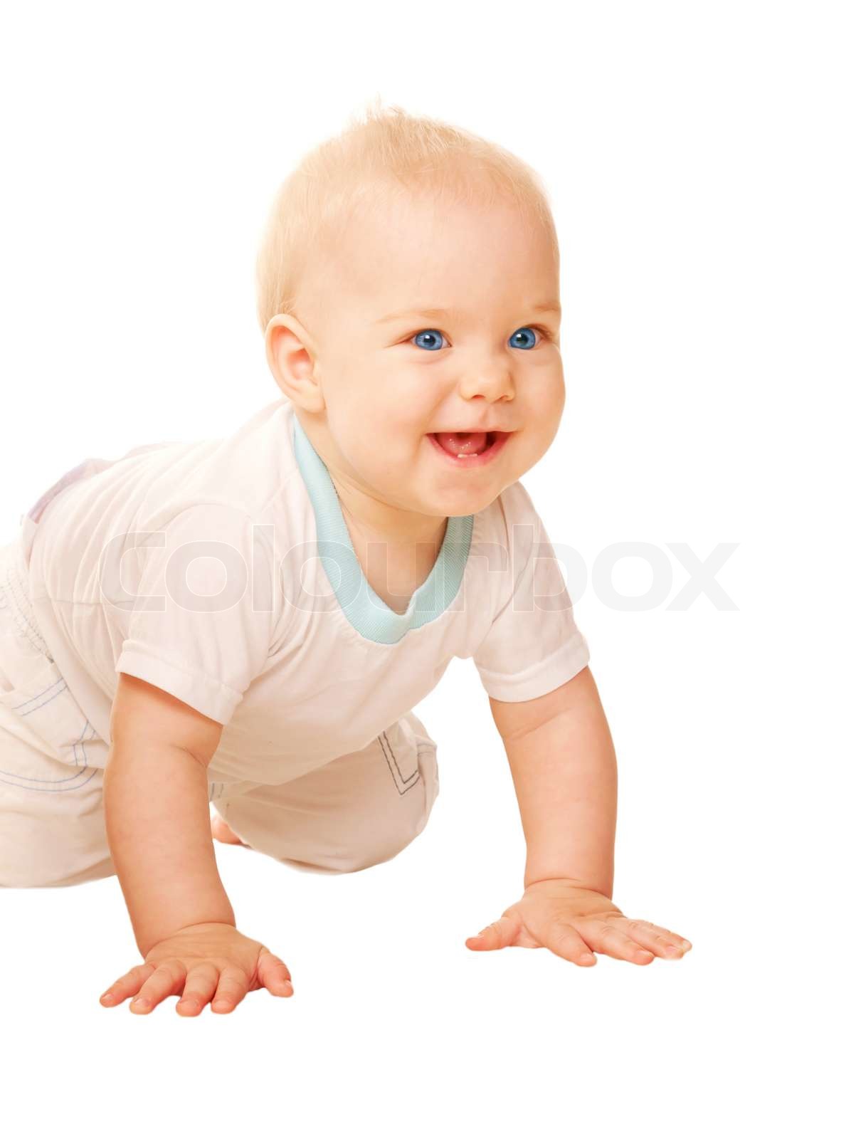 Happy baby crawling away | Stock image | Colourbox