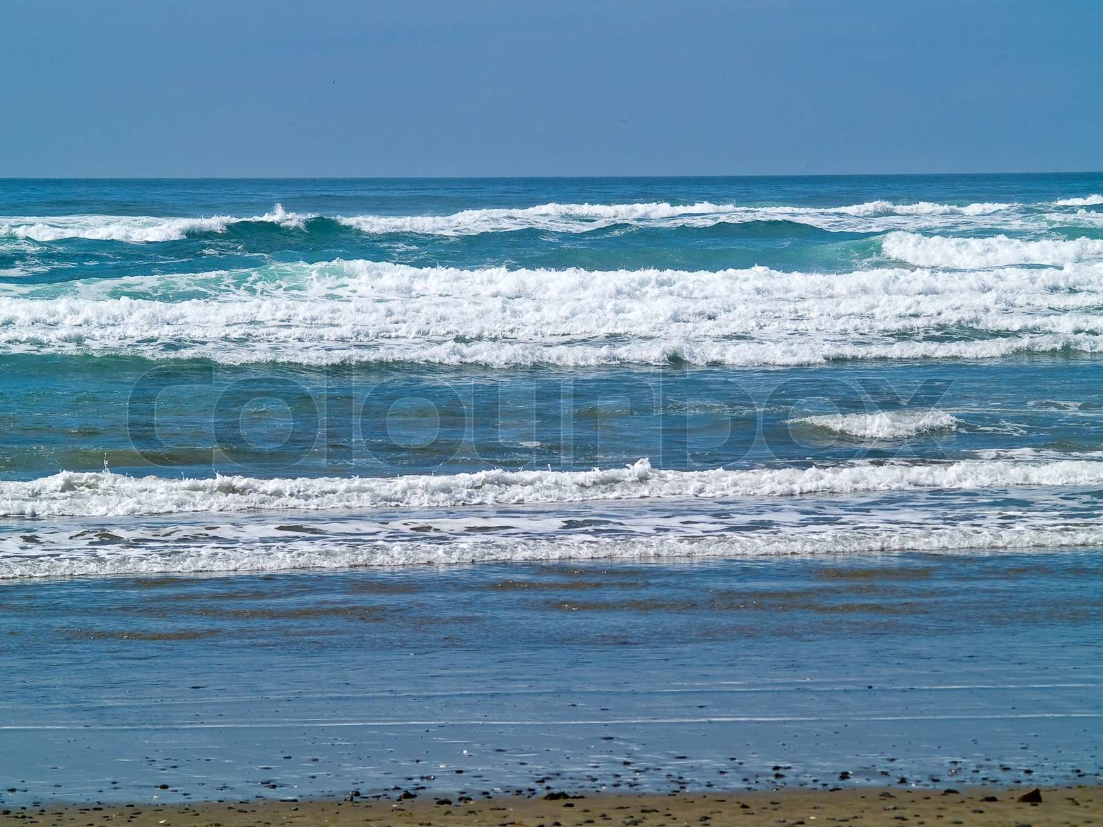 Ocean Waves on the Shore on a Clear, Sunny Day | Stock image | Colourbox