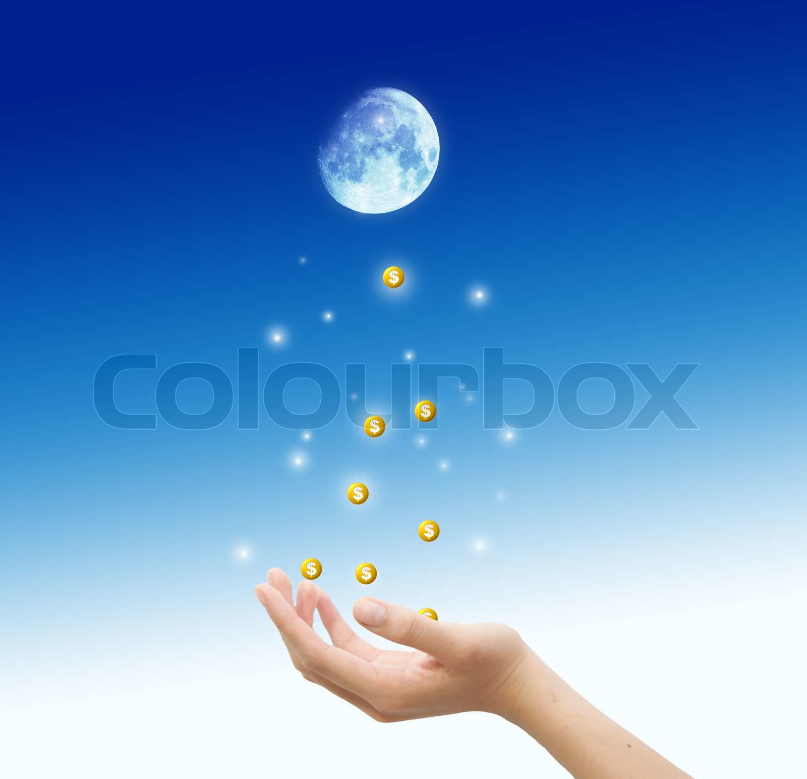Money falling from the moon | Stock image | Colourbox
