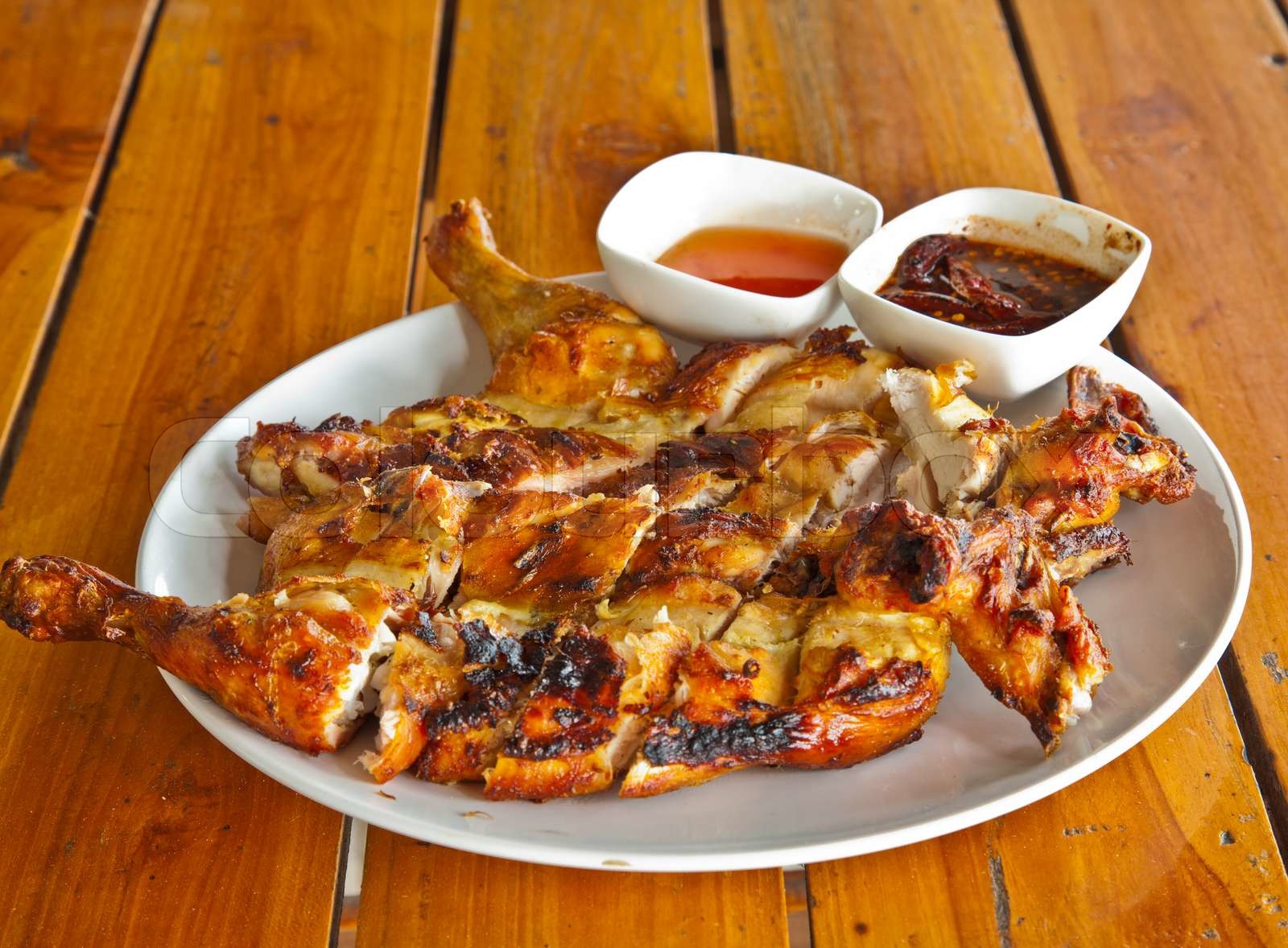 Grilled chicken on plate | Stock image | Colourbox