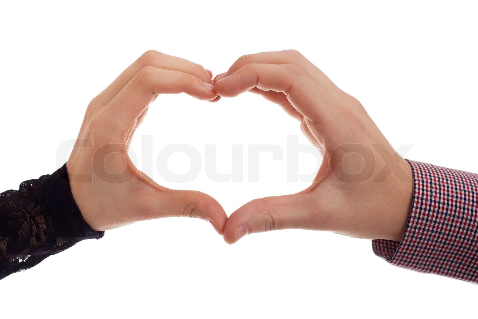 Two hands making heart symbol | Stock image | Colourbox