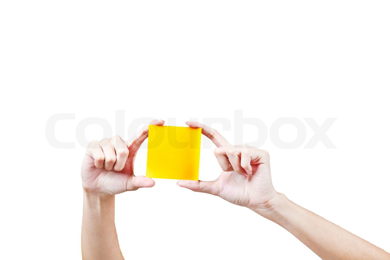 Hand and Post-it isolated on white | Stock image | Colourbox