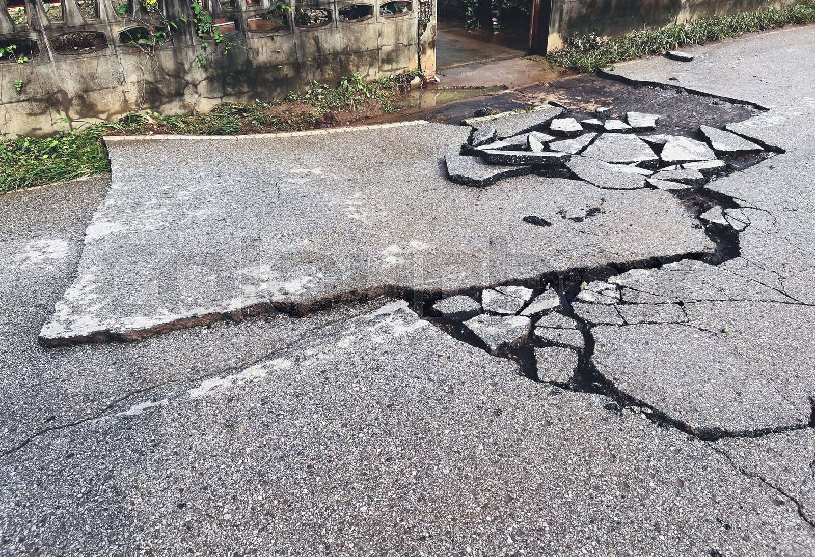 decayed road paved asphalt distressed road surface with damaged ...