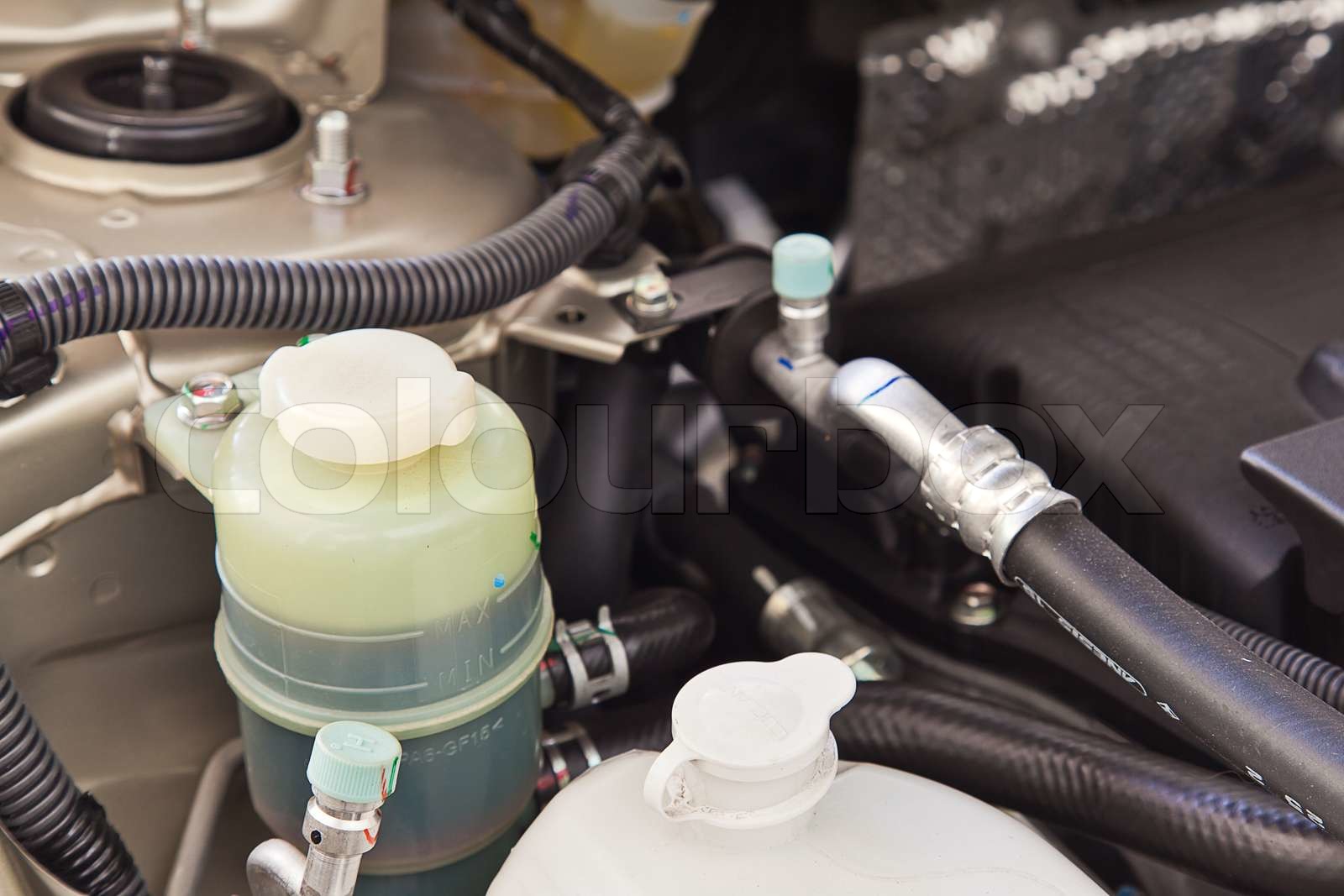Brake fluid, component of car engine | Stock image | Colourbox