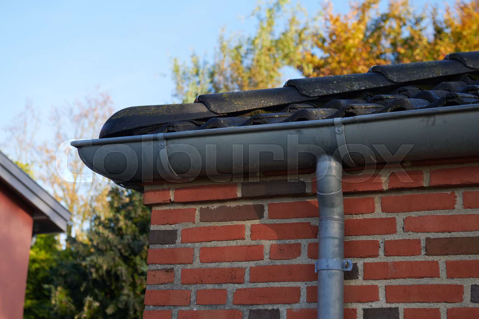 gutter, masonry, residential | Stock image | Colourbox