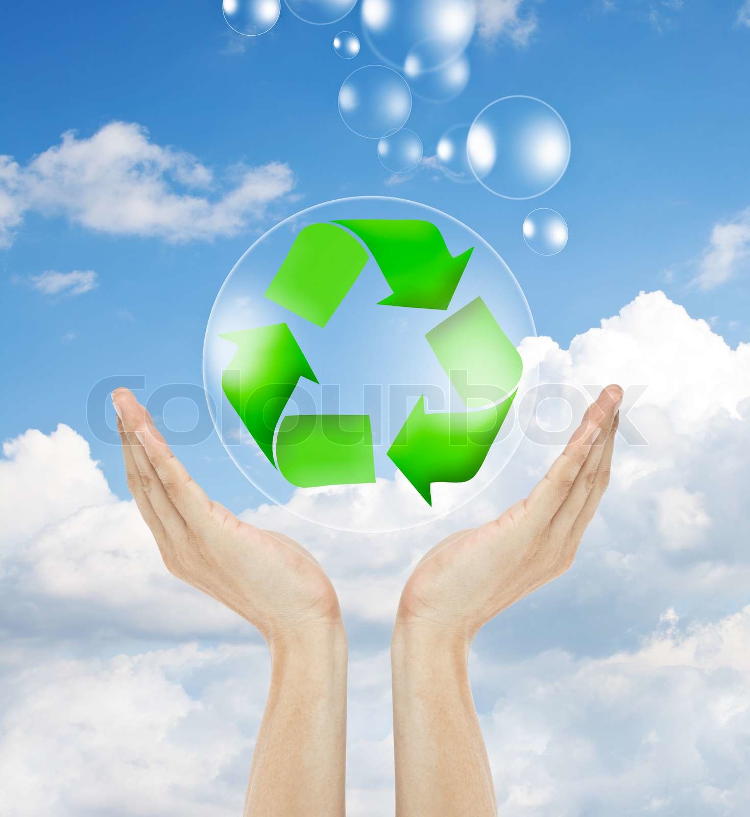 Recycle logo concept and hand | Stock image | Colourbox