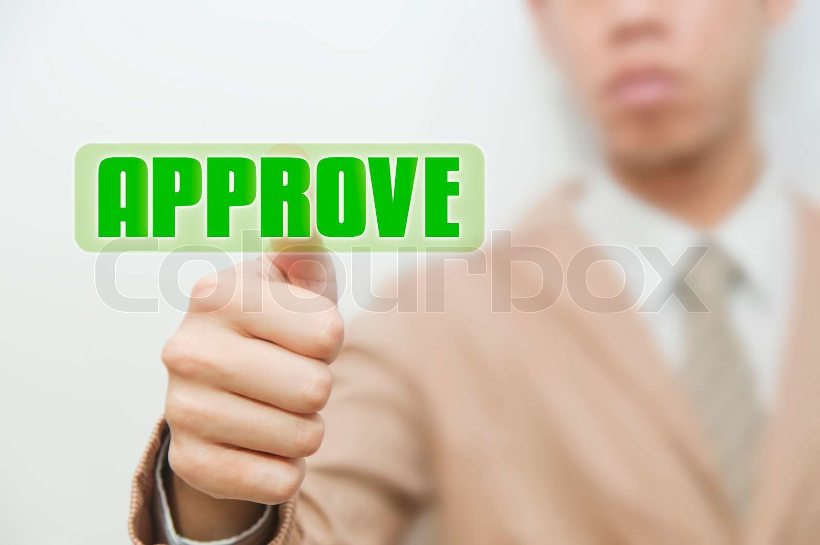 Business man pressing touch screen on approve button | Stock image ...