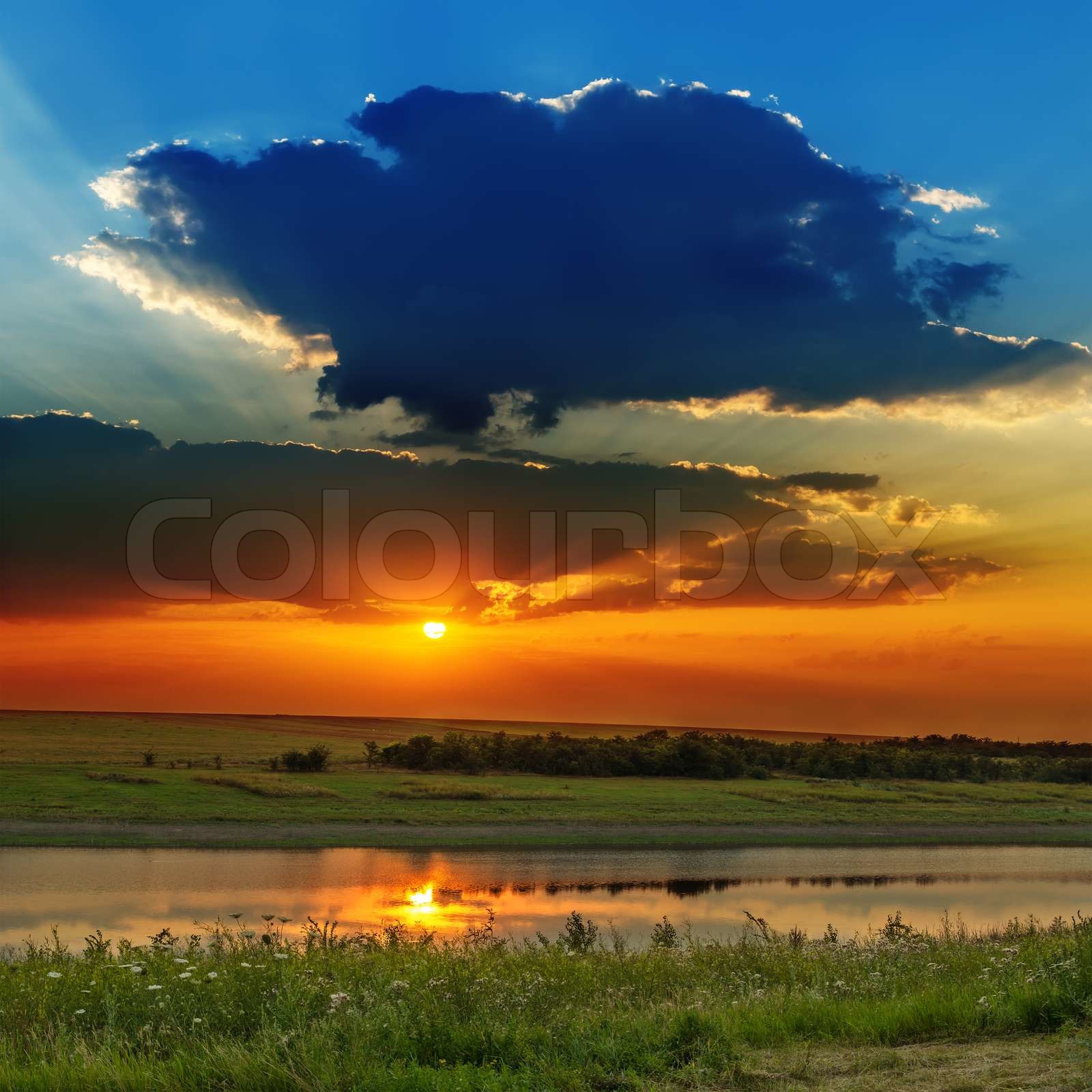 dramatic sunset over river | Stock image | Colourbox