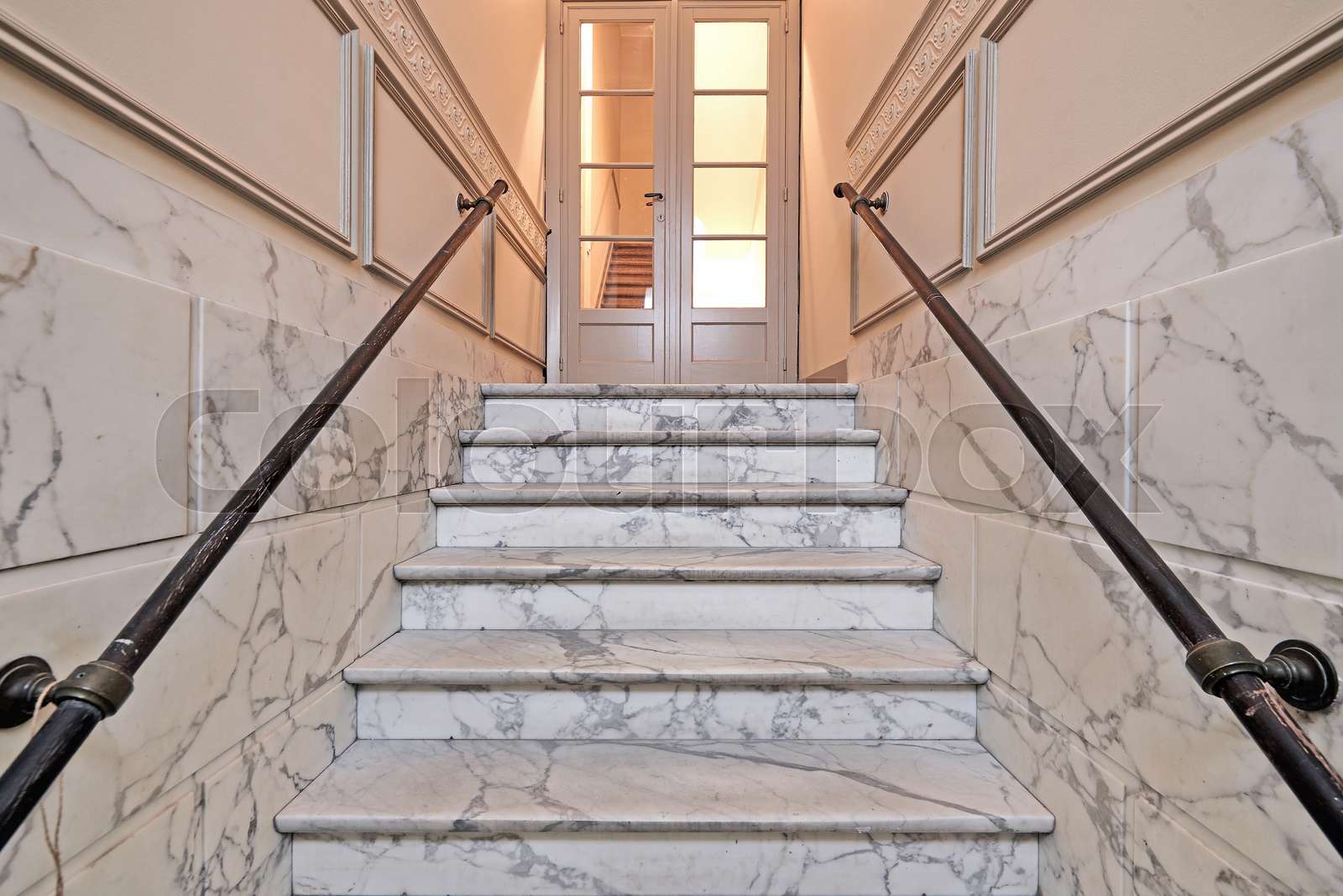 Marble stairs in renovated mansion stairwell | Stock image | Colourbox