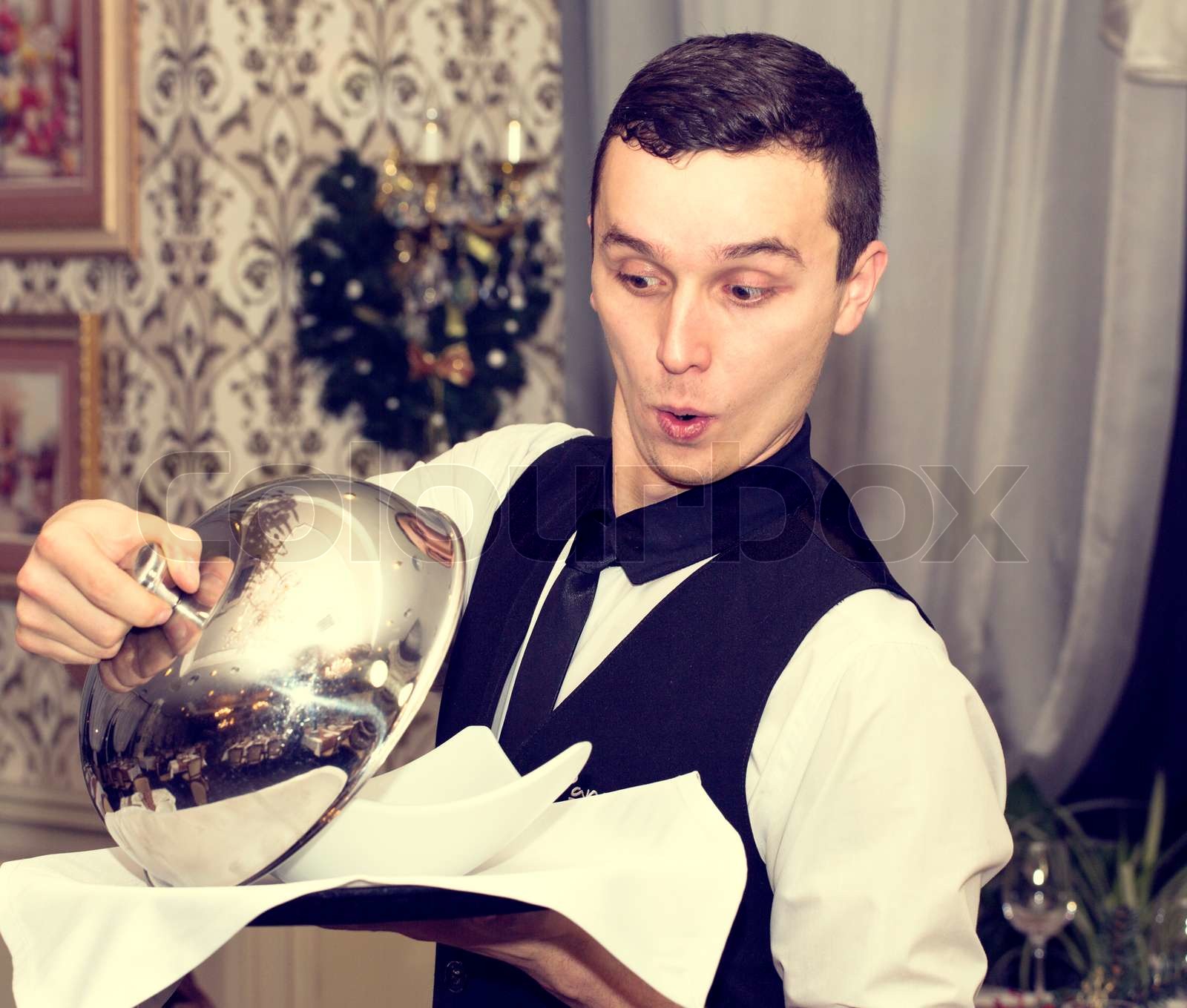 Vintage portrait of a waiter in a restaurant | Stock image | Colourbox