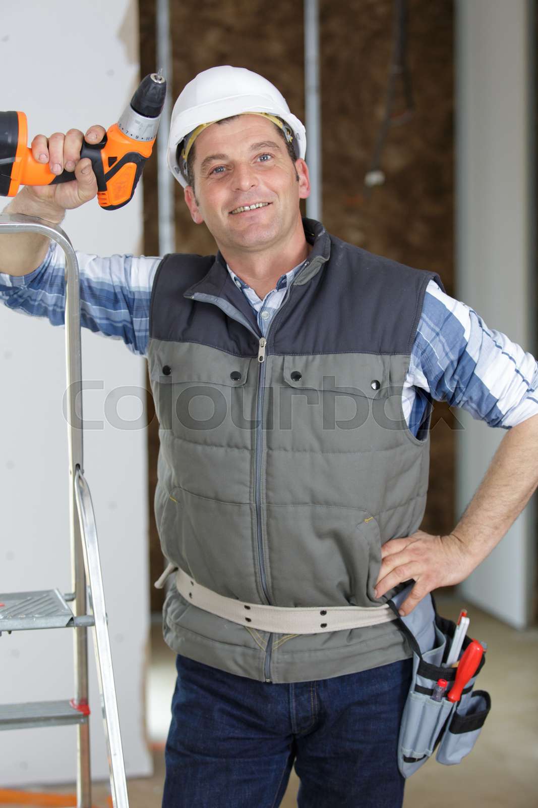 mature happy handsome repairman wearing hardhat smiling posing | Stock ...