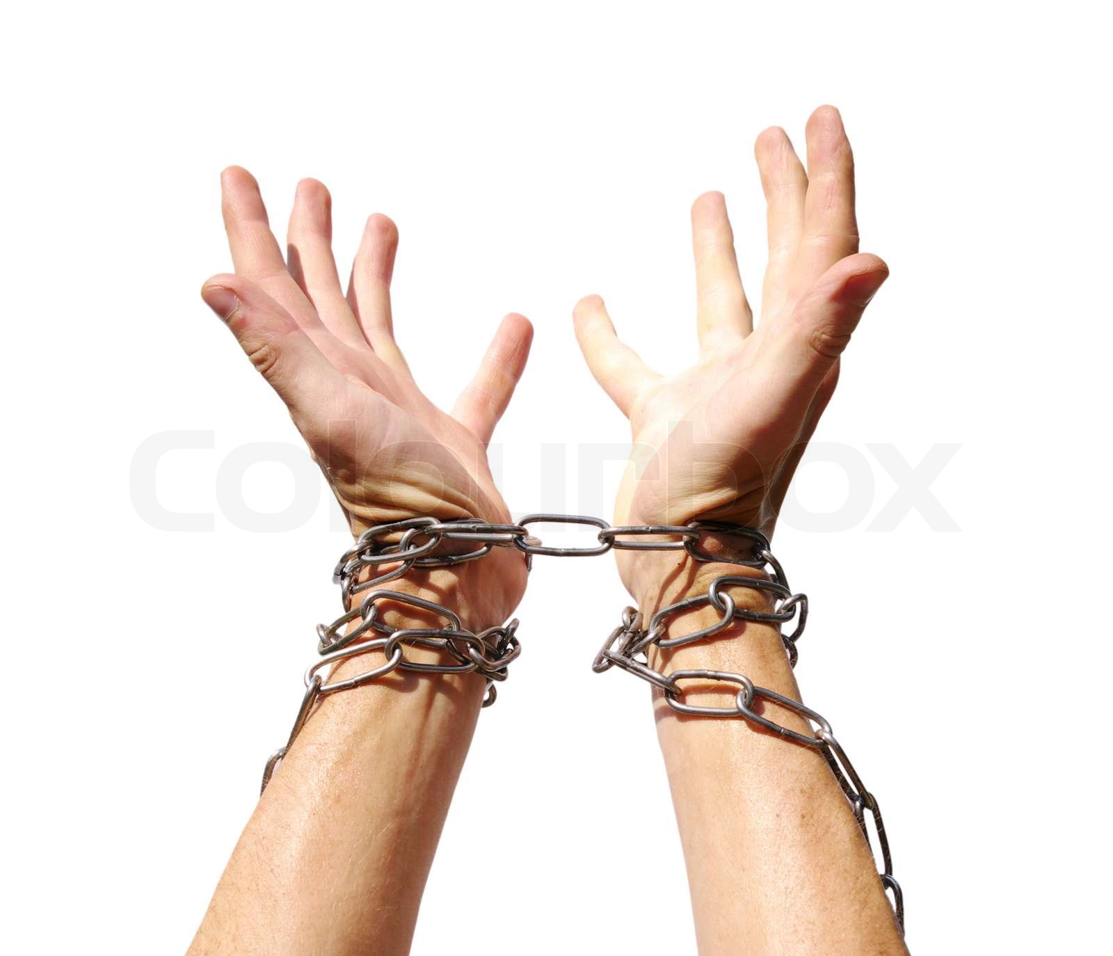 Hands chained together | Stock image | Colourbox
