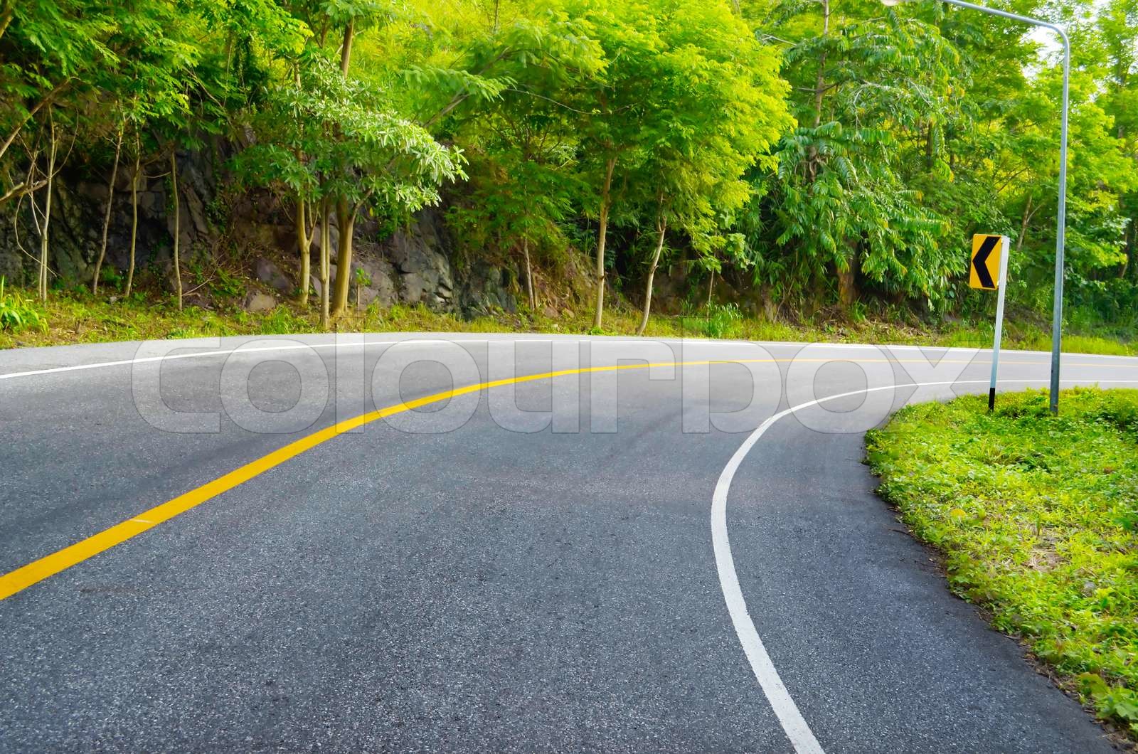 Asphalt road sharp curve | Stock image | Colourbox