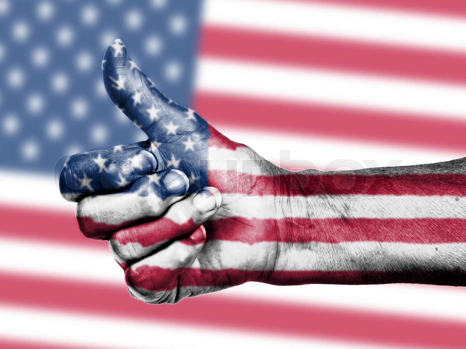 US flag on thumbs up hand | Stock image | Colourbox