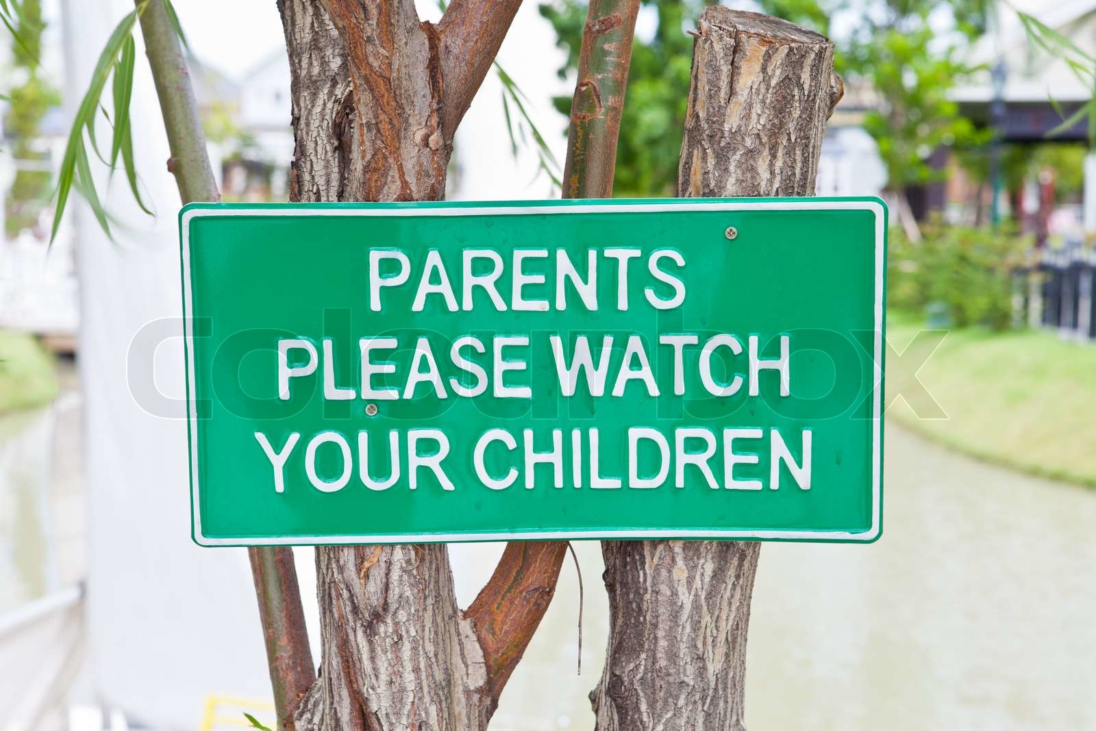 Parents Please Watch Your Children sign board | Stock image | Colourbox