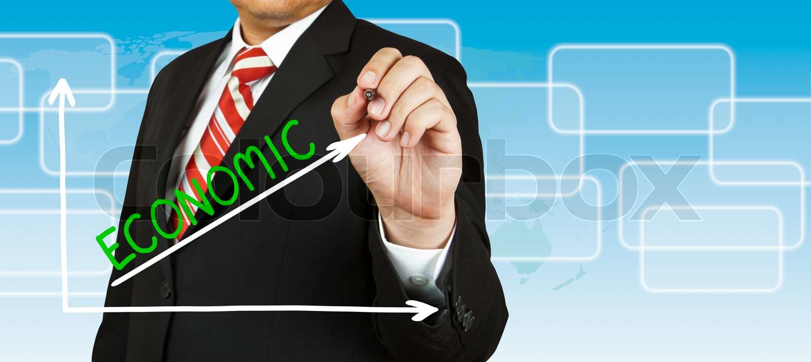 Male hand drawing a graph with Economic going up | Stock image | Colourbox