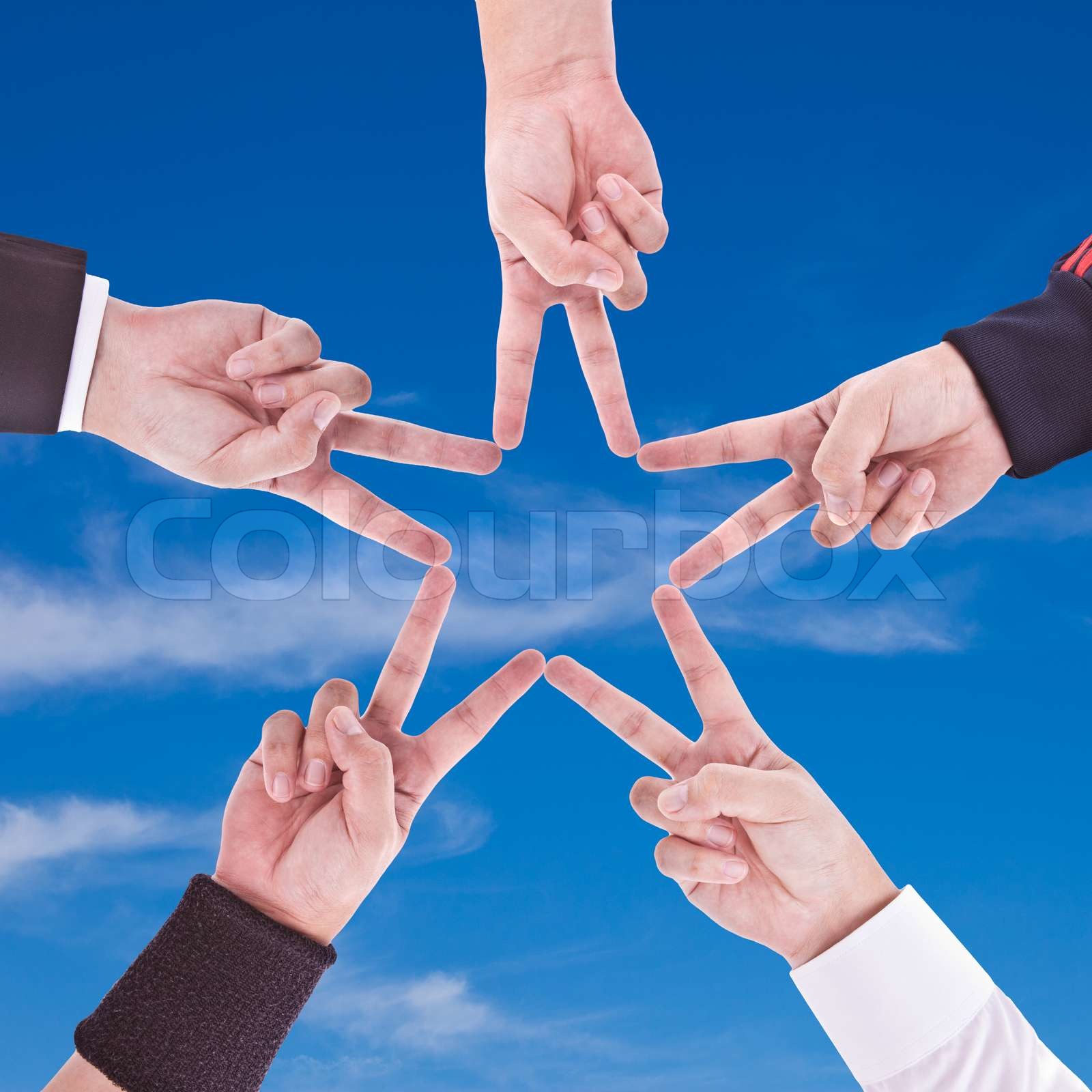 Hands in the form of a star | Stock image | Colourbox