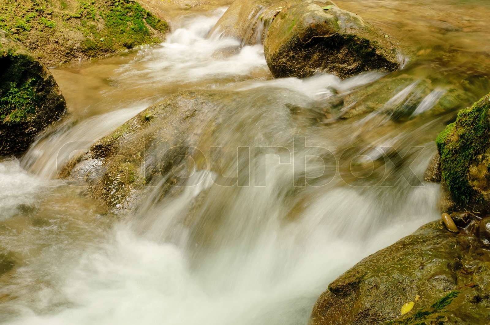 Fast flowing water | Stock image | Colourbox