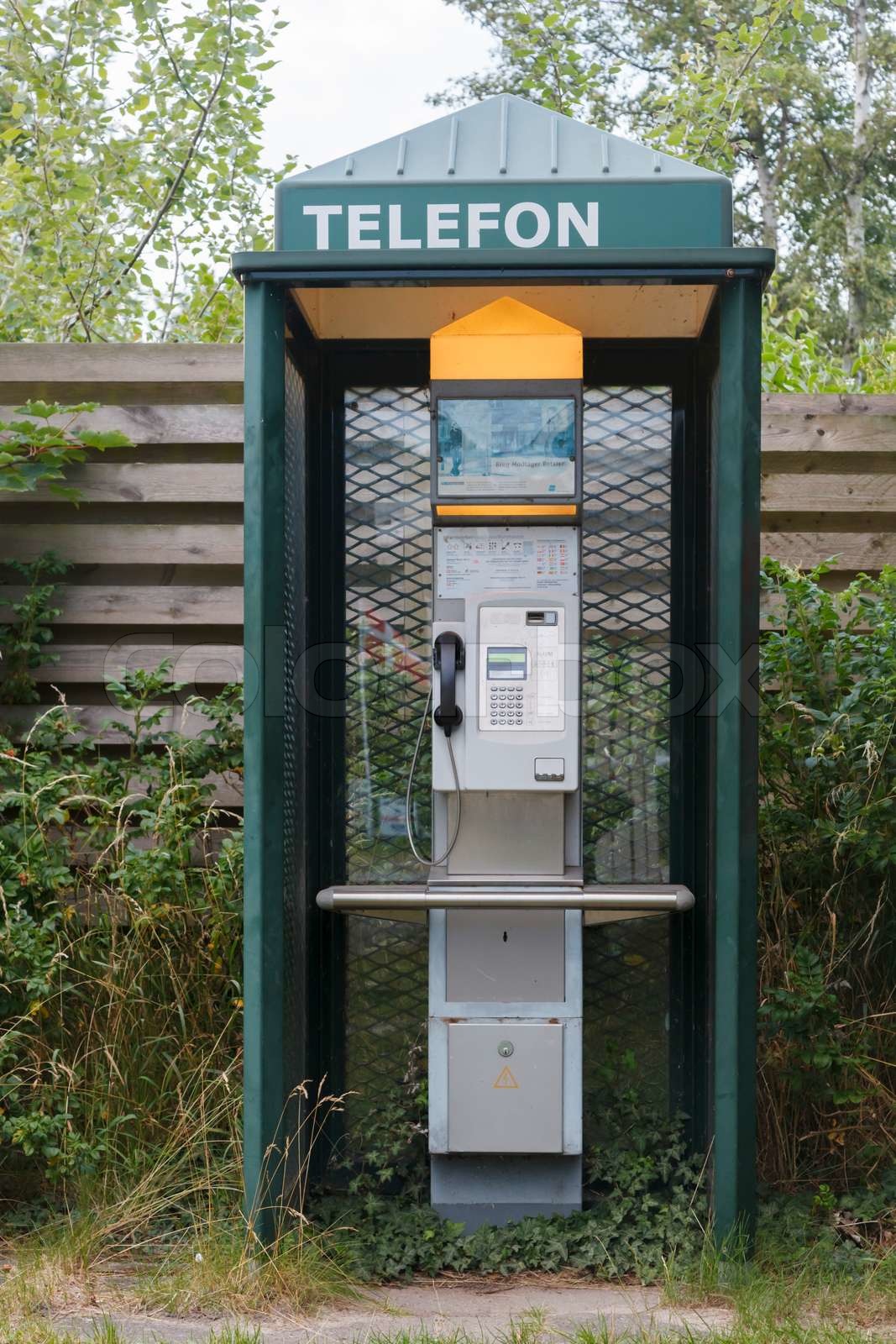 Green phone booth | Stock image | Colourbox