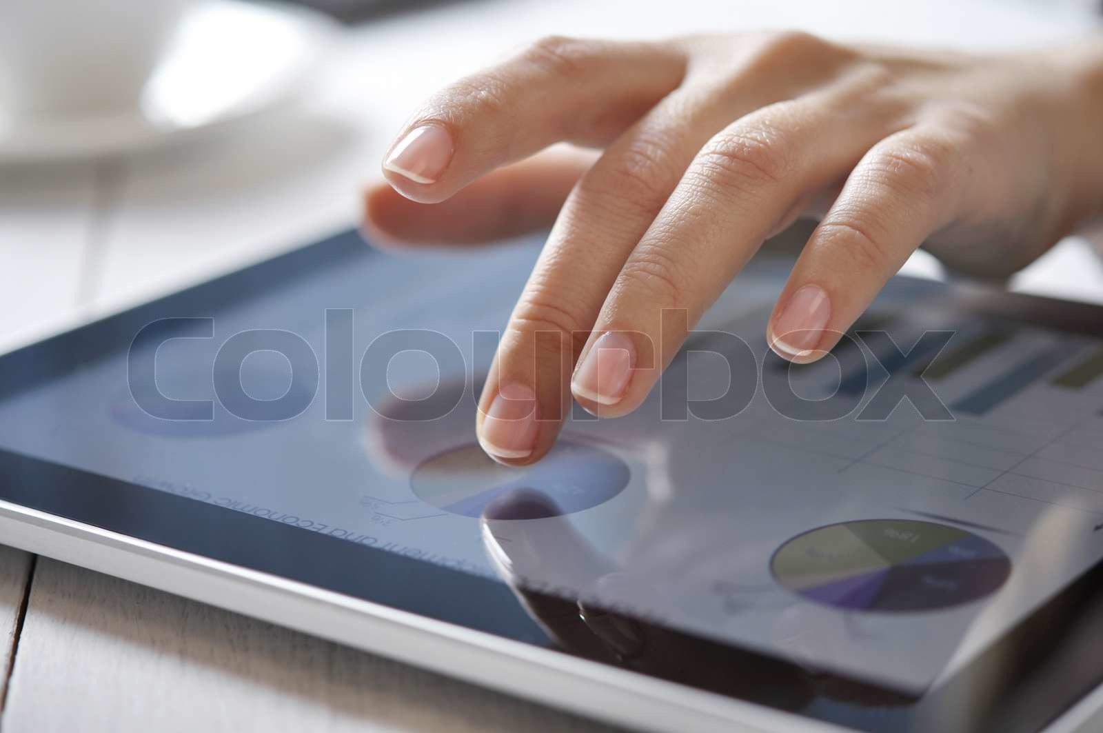 finger touching screen on touchpad | Stock image | Colourbox