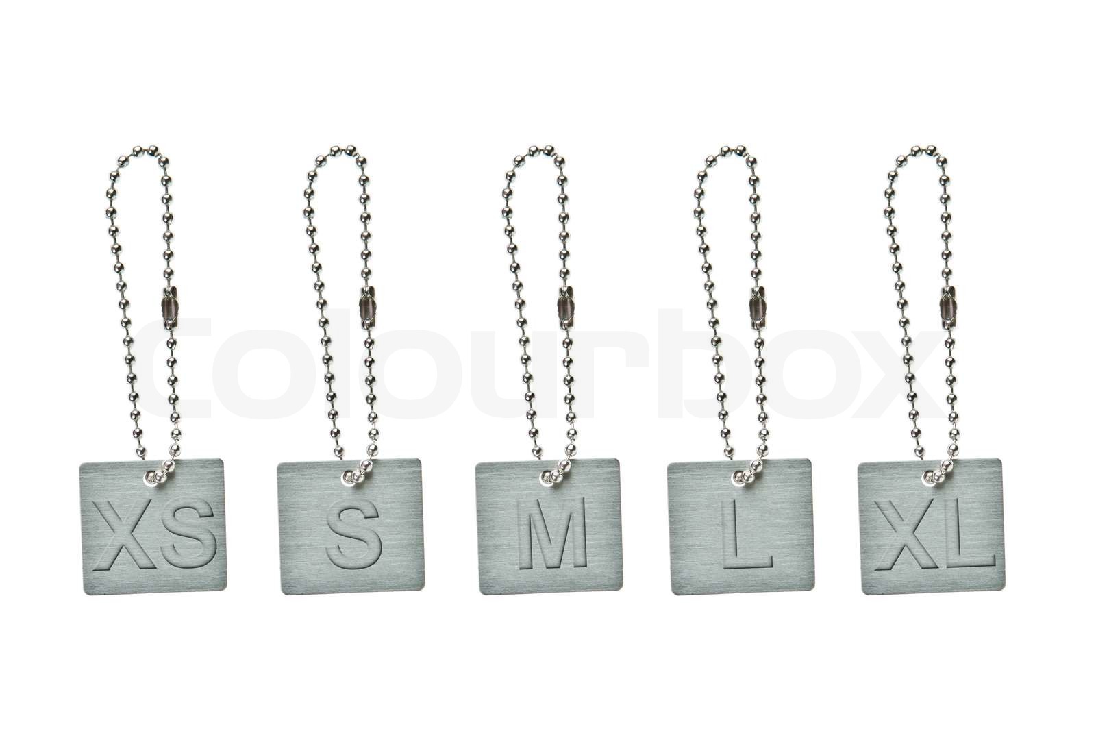 Set of silver metal tag with cloth size sign | Stock image | Colourbox