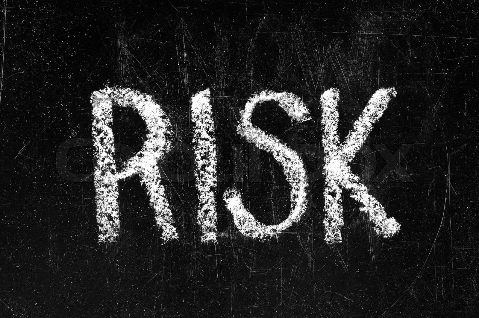 RISK on Blackboard | Stock image | Colourbox