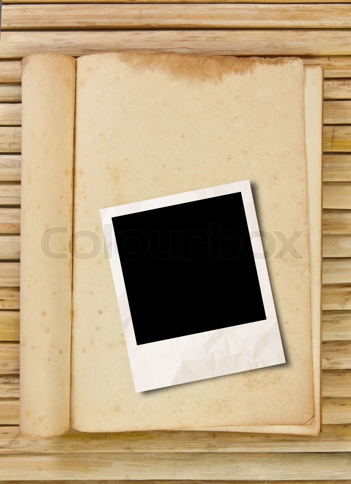 photo frame with book | Stock image | Colourbox