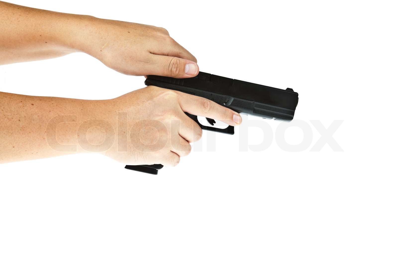 Airsoft hand gun, glock model with hand | Stock image | Colourbox