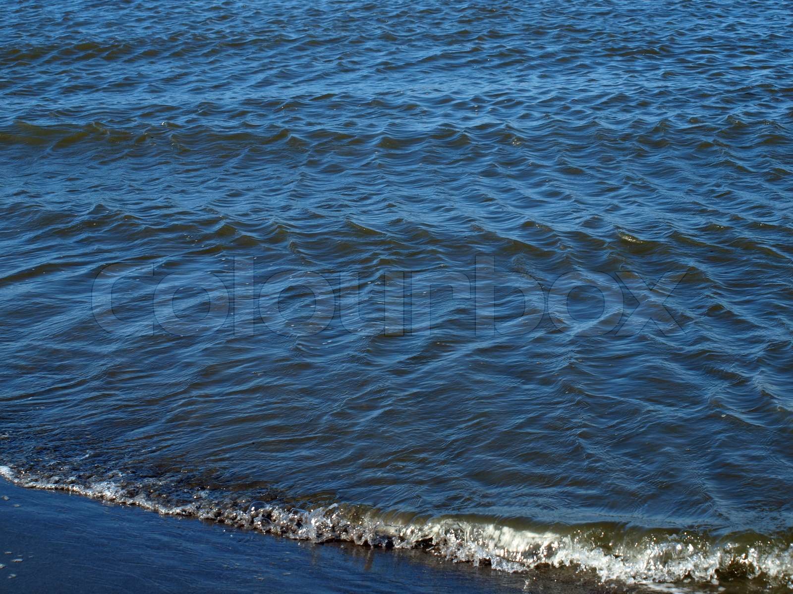 Ripples on the Surface of the Deep Blue Ocean | Stock image | Colourbox