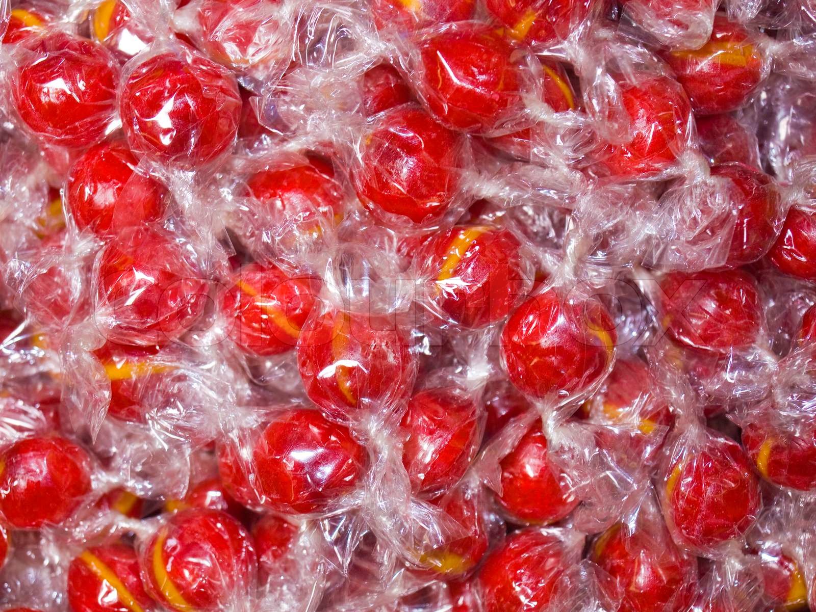Colorful Hard Candy in Wrappers as a Background | Stock image | Colourbox