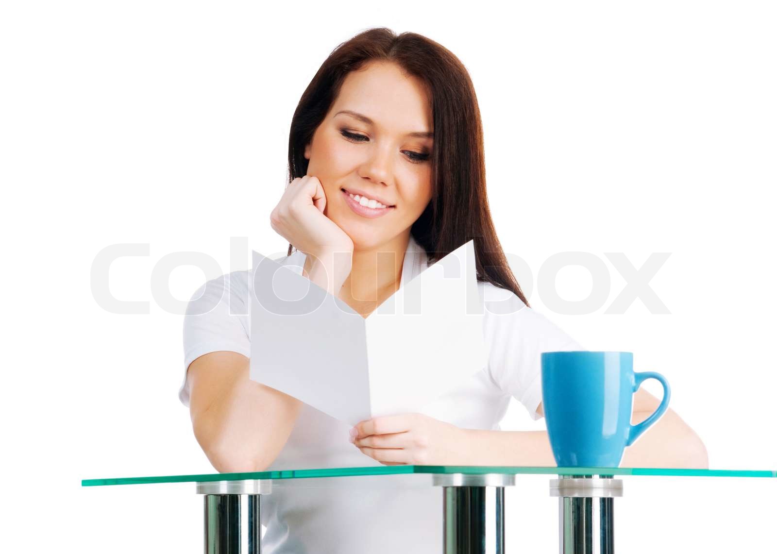 girl is reading a card | Stock image | Colourbox