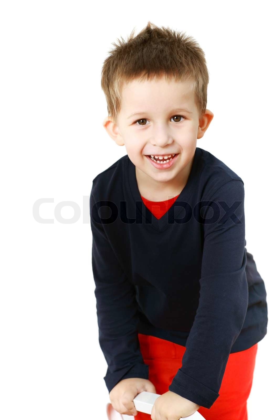 Playful little boy smiling | Stock image | Colourbox