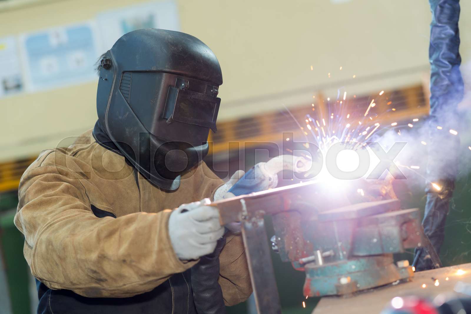 welder cut off a piece of metal autogenous welding | Stock image ...