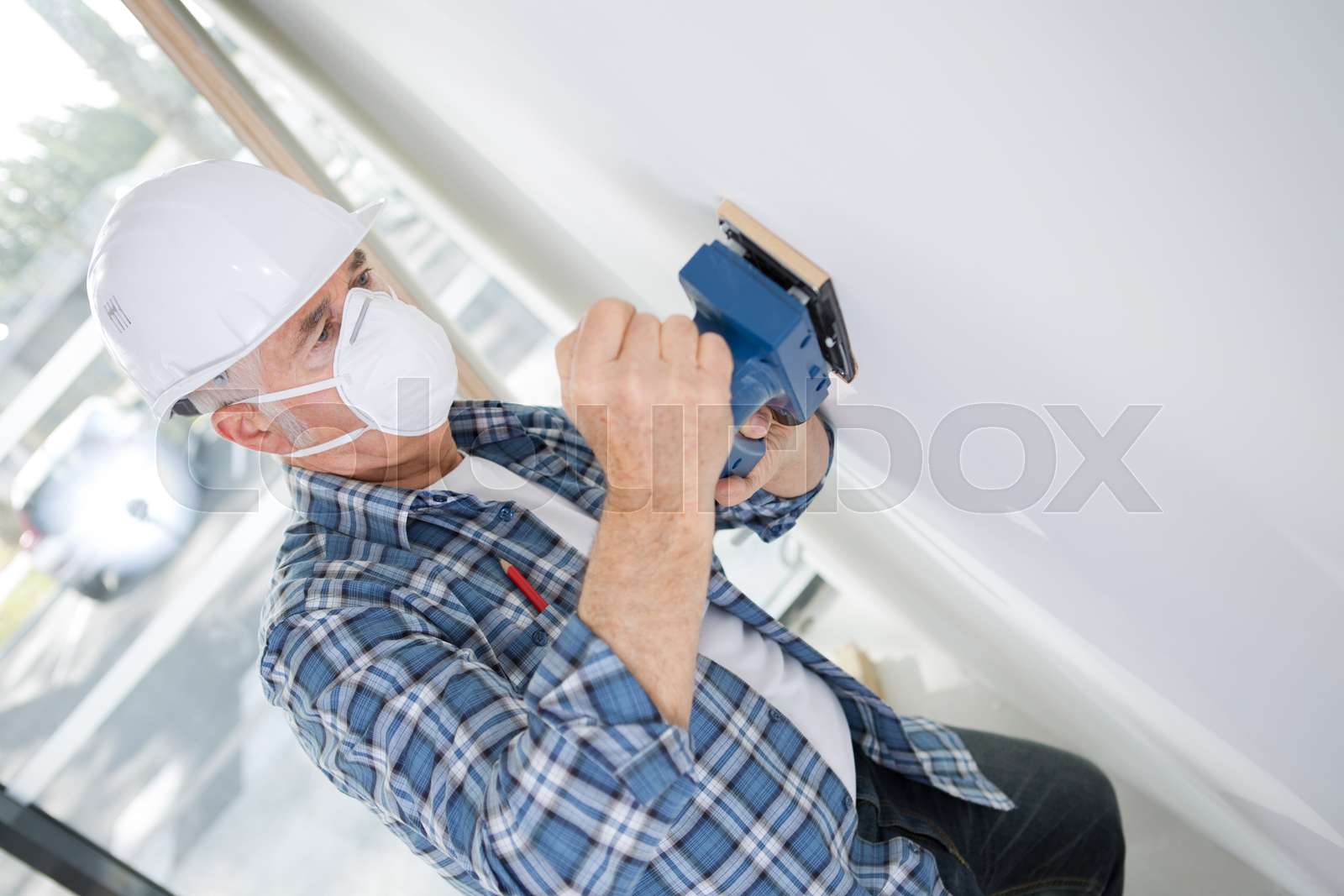 handwerker, sander, wand | Stock Bild | Colourbox handwerker, sander, wand | Stock Bild | Colourbox