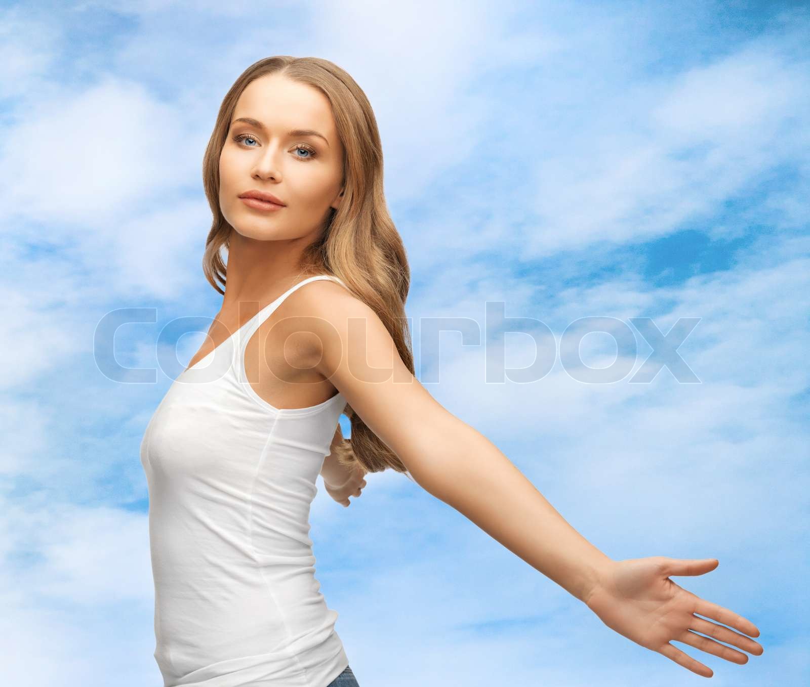 woman spreading hands | Stock image | Colourbox