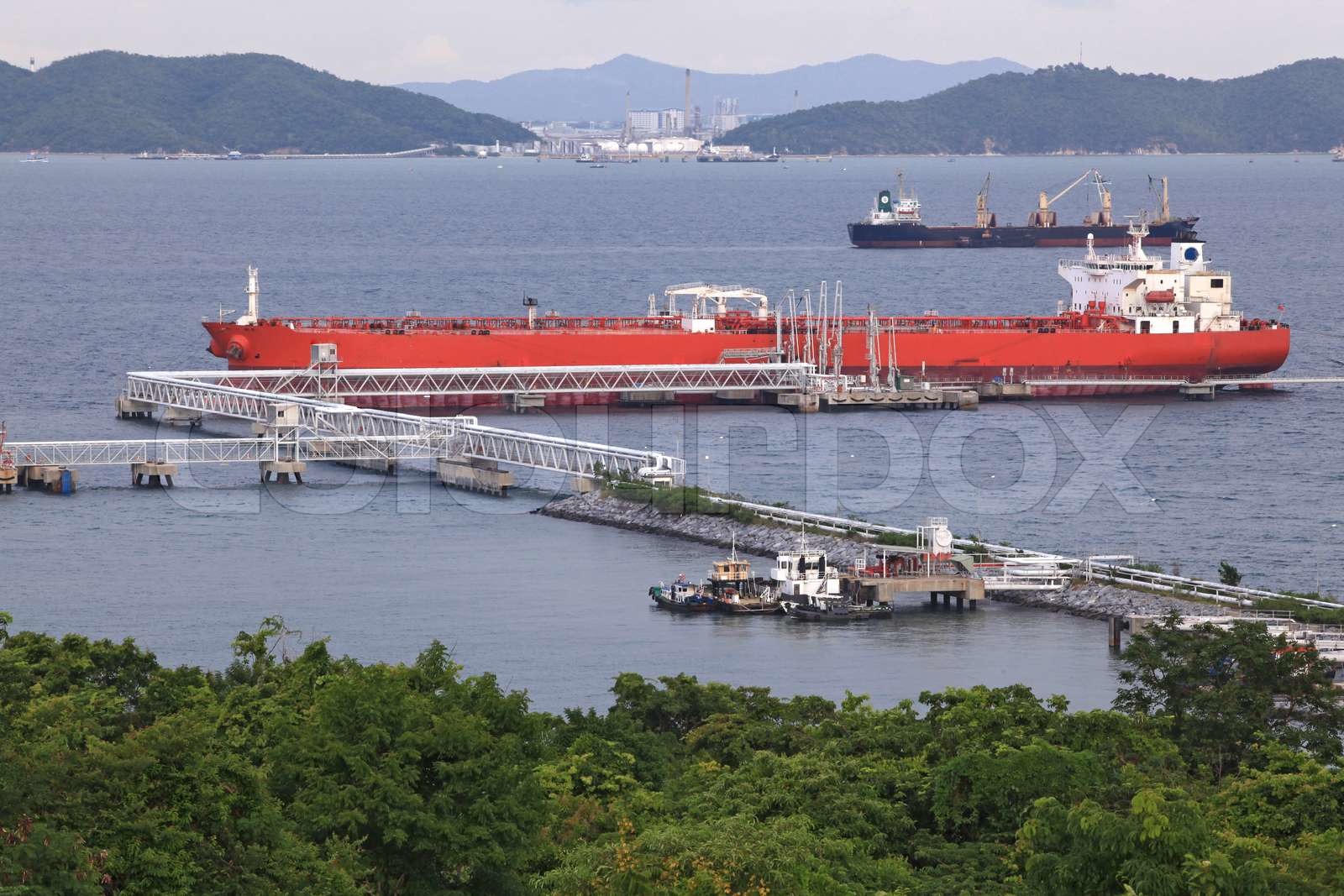 boat unloading cargo | Stock image | Colourbox