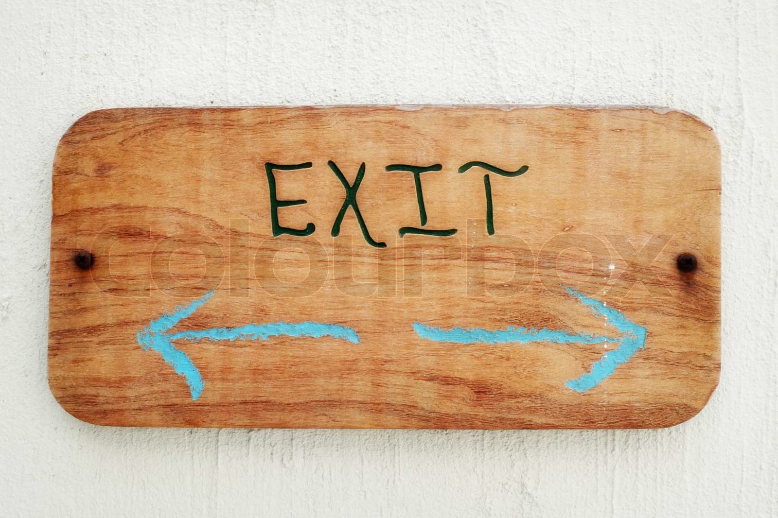 Exit sign on Antique wooden board | Stock image | Colourbox