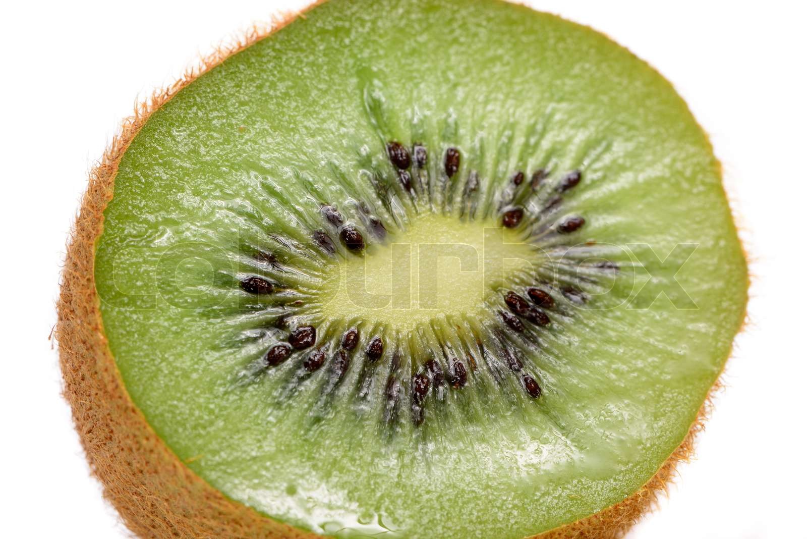 Cross Section of Kiwi Fruit Close-Up on White Background | Stock image ...