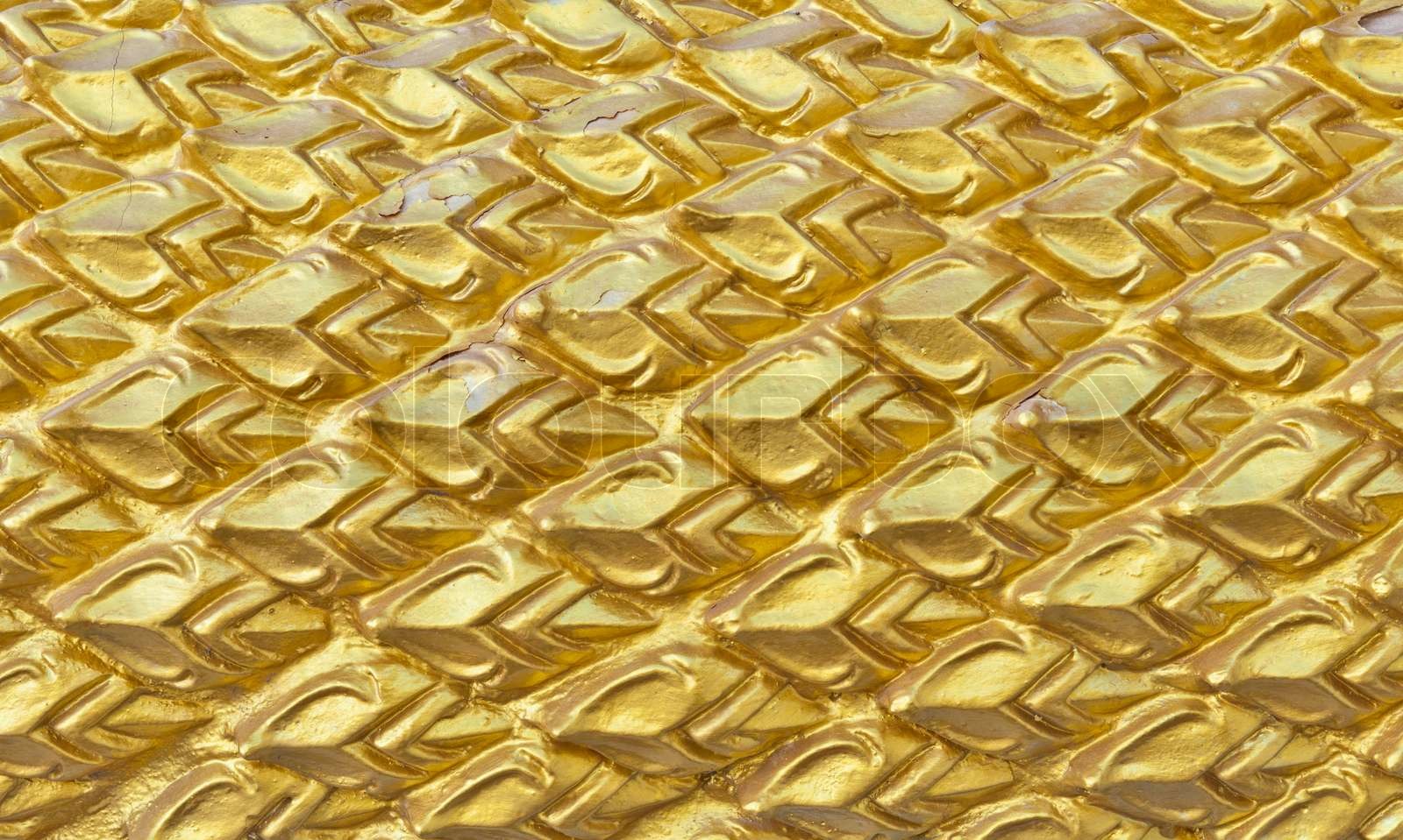 Texture sculpture of Golden Dragon scales | Stock image | Colourbox