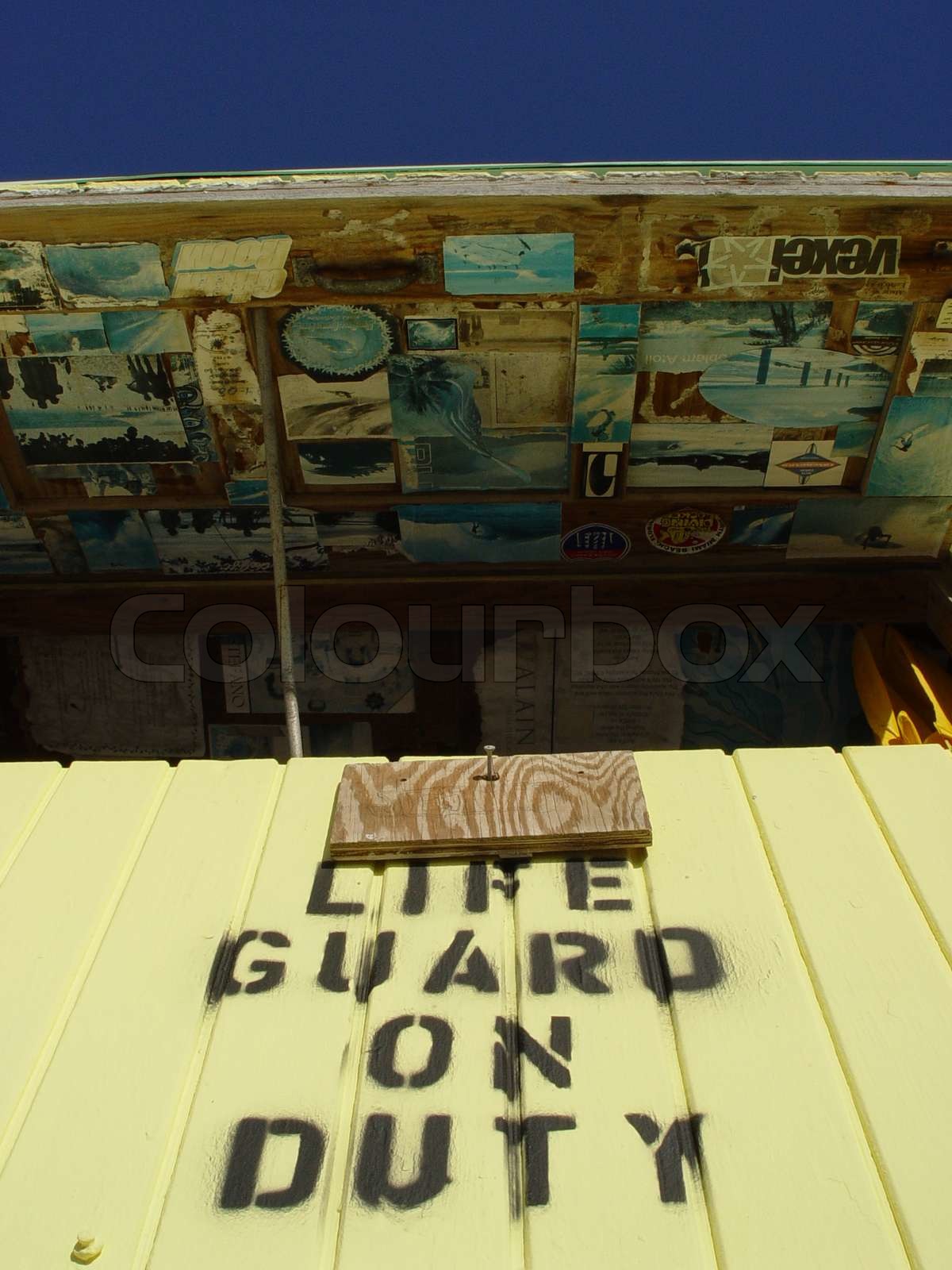 Lifeguard hut and signage on wall | Stock image | Colourbox
