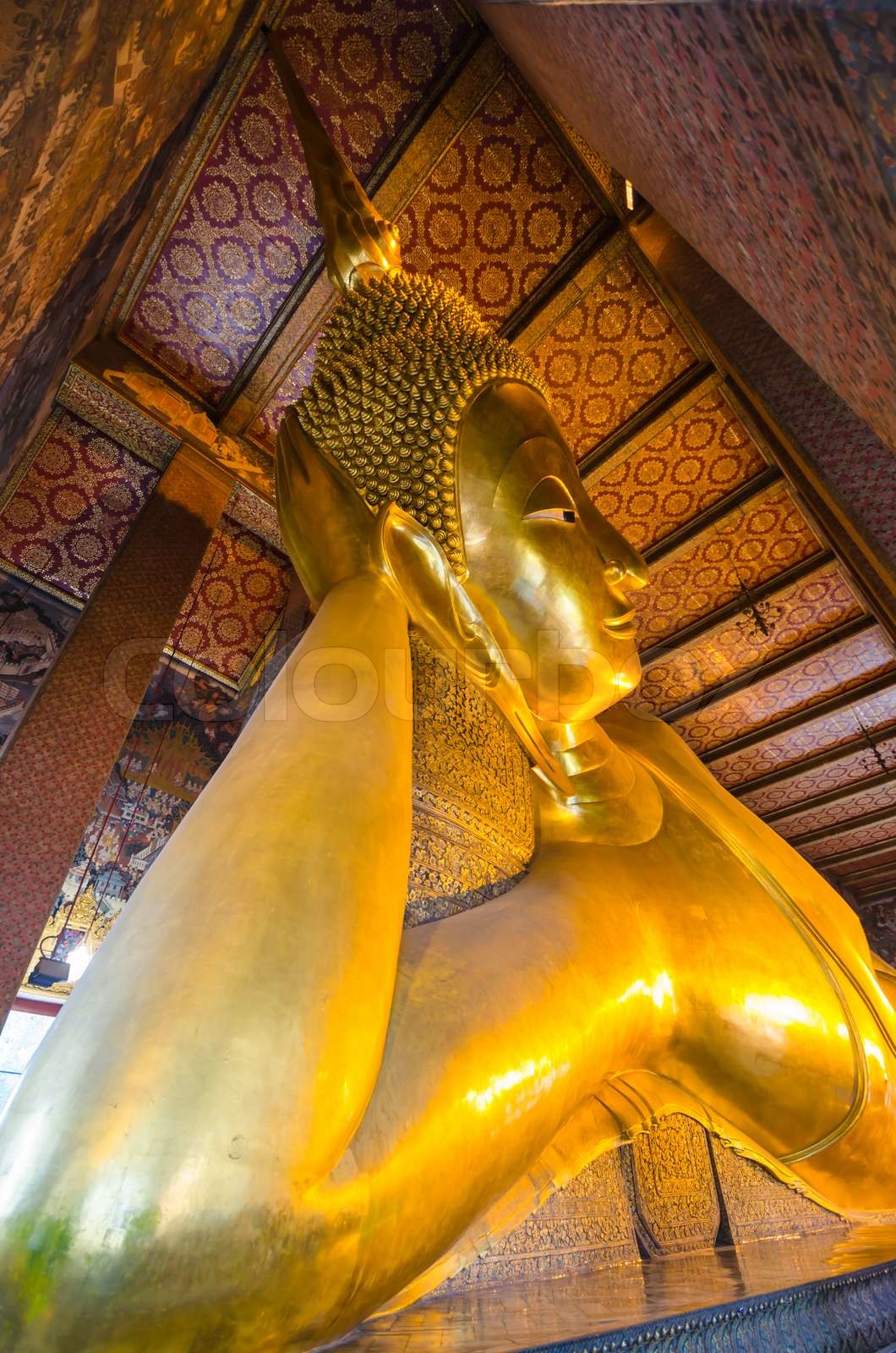 Big gold statue monk | Stock image | Colourbox
