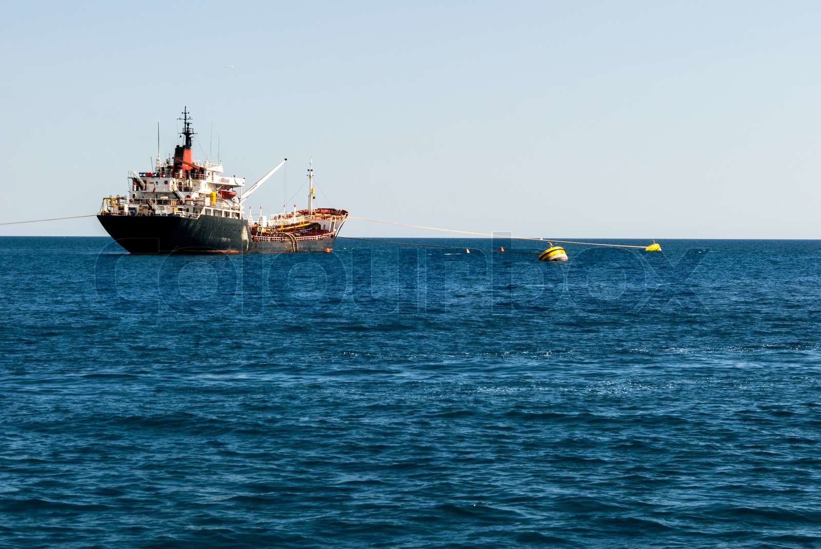 Cargo ship at sea | Stock image | Colourbox
